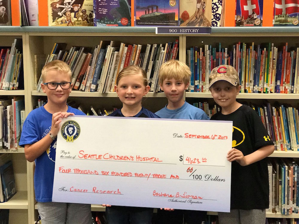 Lakeridge K-Kids Club presents $4,623.66 donation to Seattle Children's ...